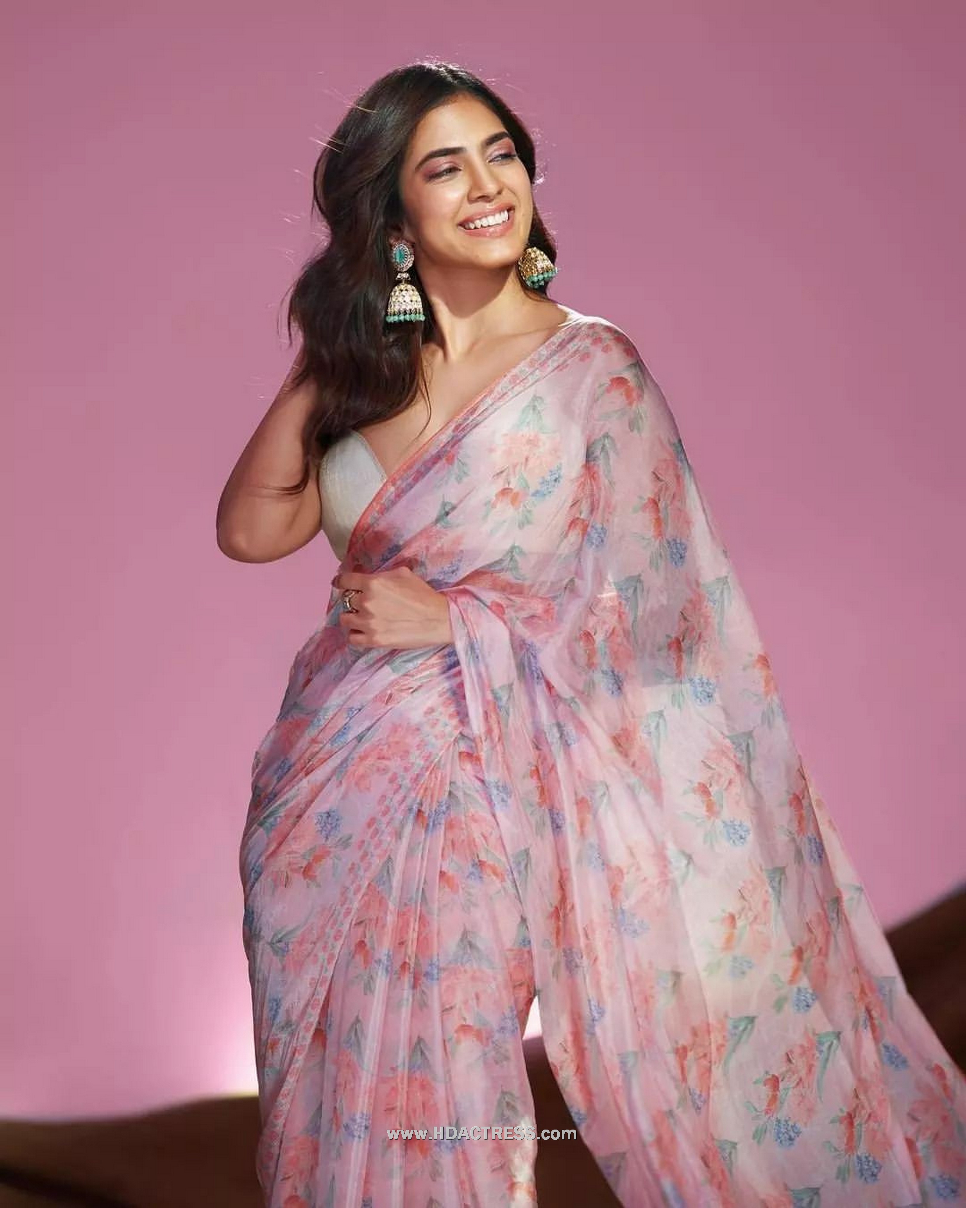 Malavika Mohanan Looks Super Sexy In Pink Saree In These Glam Stills