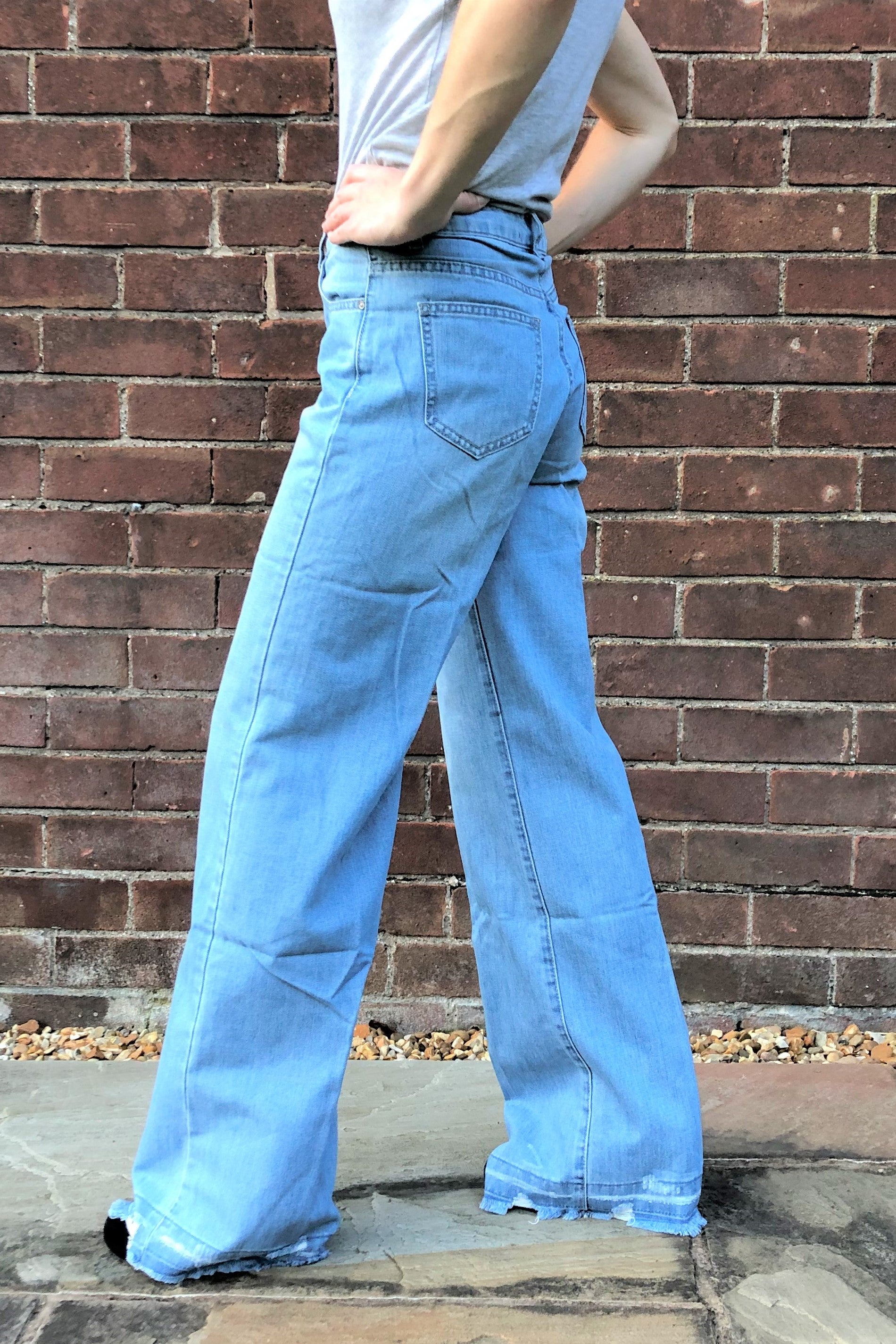 Wide Flared Leg Jeans Ripped Frayed Leg Ends Light Blue Glamour