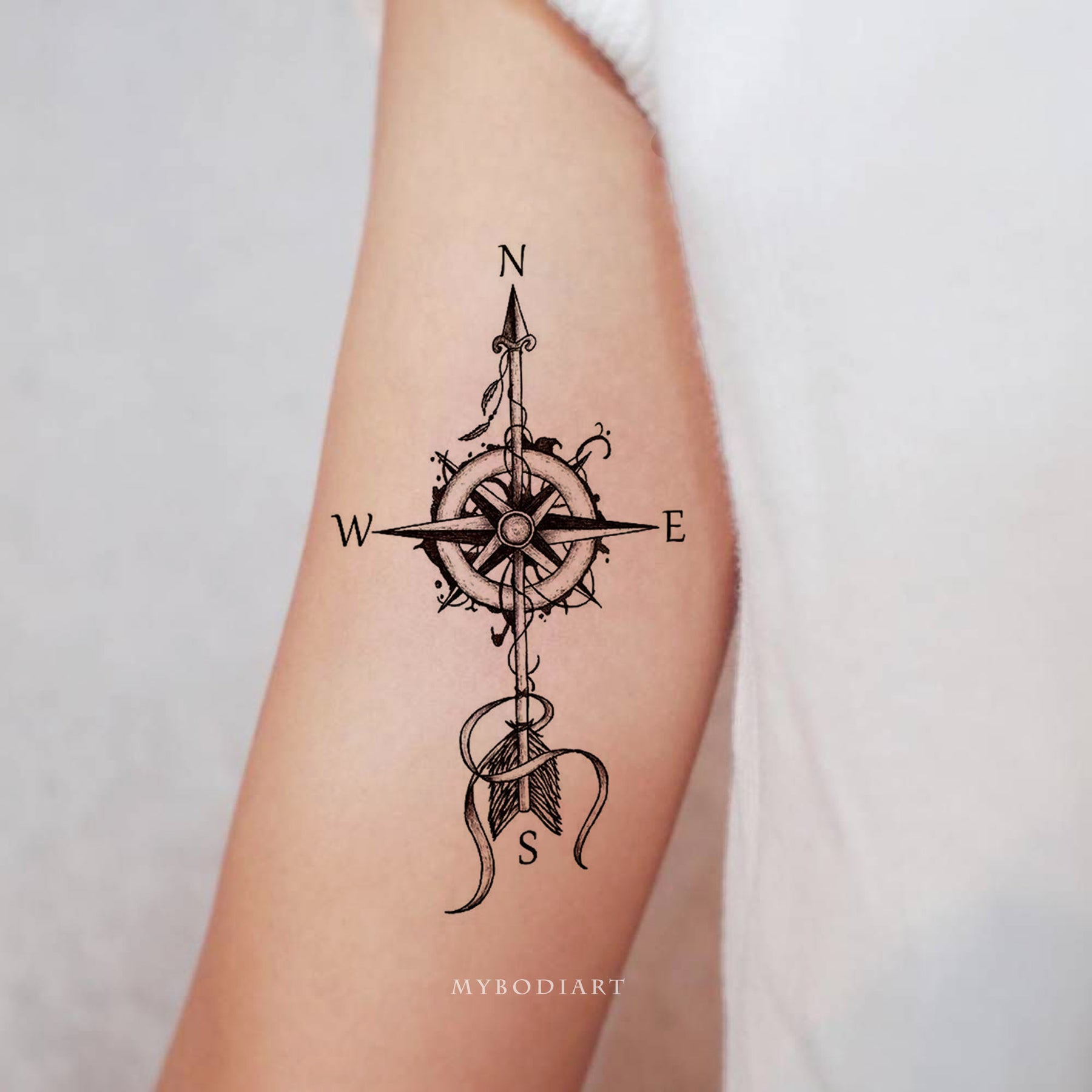 Arrow Compass Tattoo Wrist