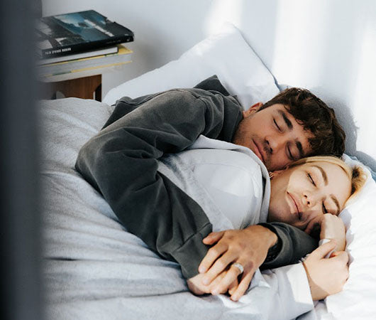 12 Couple Sleeping Positions And What They Mean Gravity Blankets