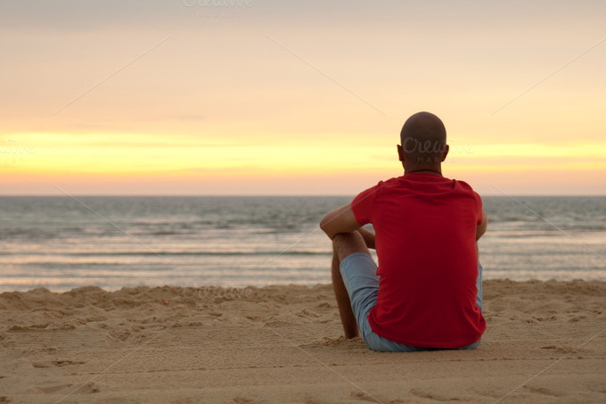 Young Man Sitting In The Beach Sand ~ People Photos On Creative Market