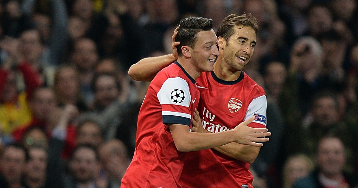 Mesut Ozil Mathieu Flamini Arsenal1 Planet Football