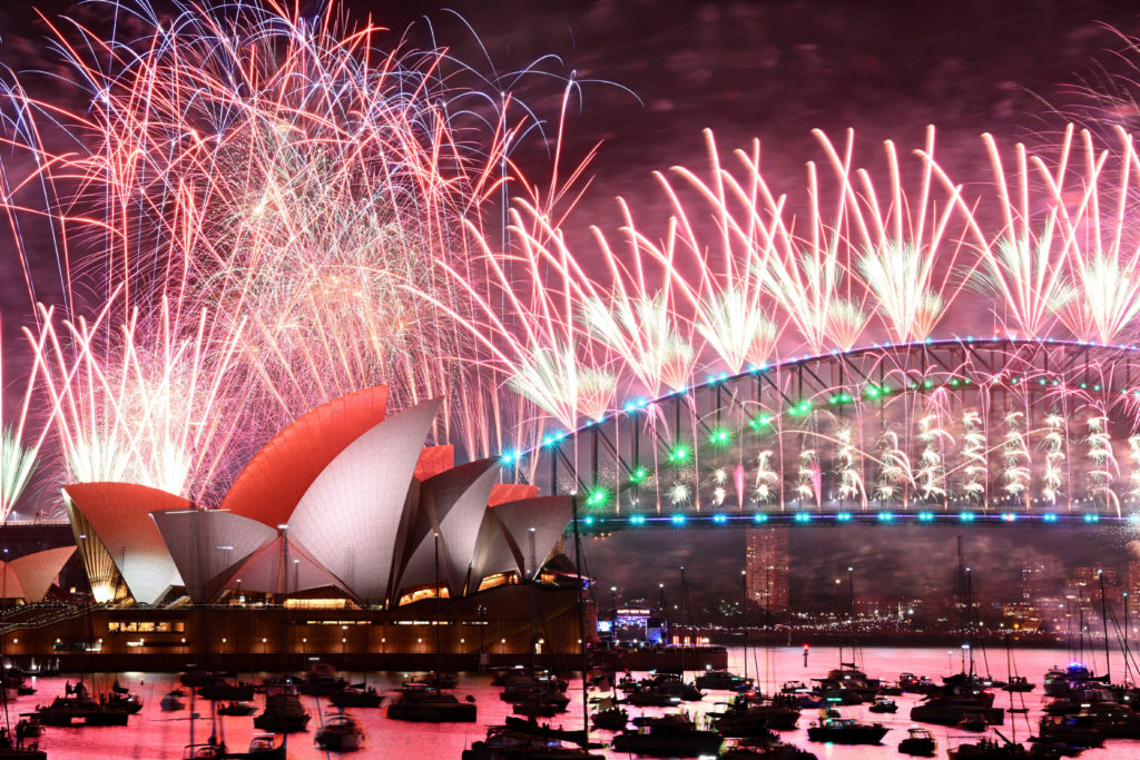 New Years Eve Celebrations Sweep Around The World But Wars Cast A