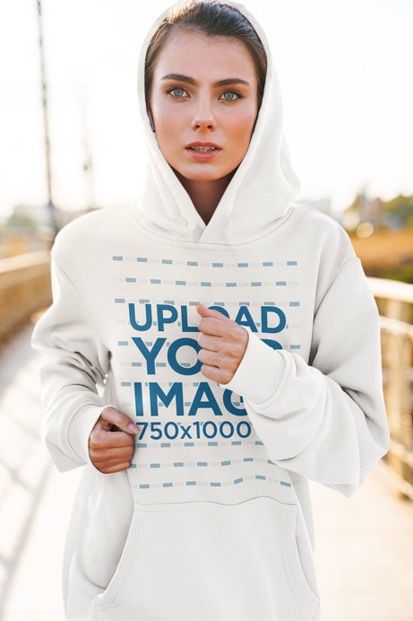 Placeit Pullover Hoodie Mockup Of A Woman Jogging On The Street