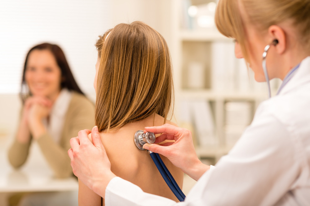 Girl Being Examine With Stethoscope By Pediatrician Royalty Free Stock