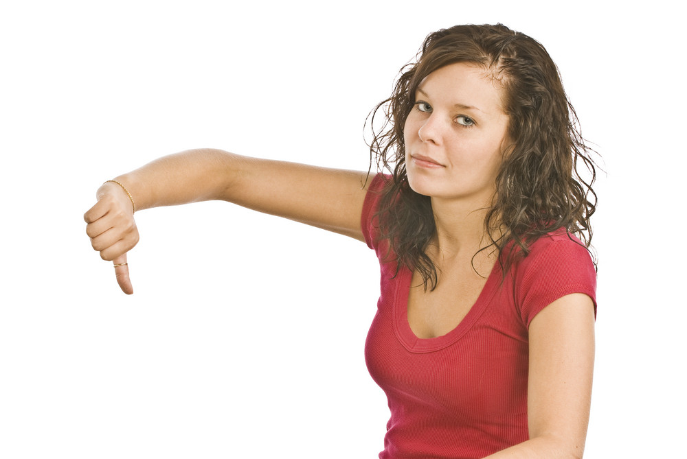 Young Woman Giving Thumbs Down Sign Royalty Free Stock Image Storyblocks