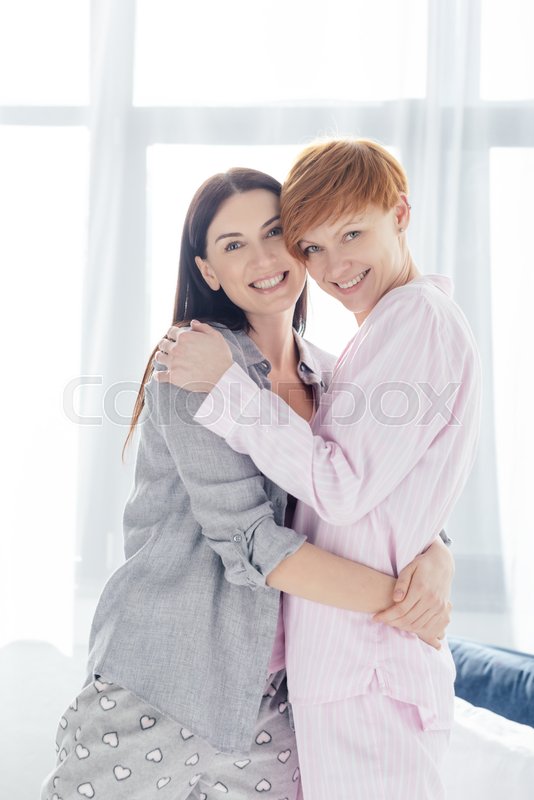 Smiling Same Sex Couple Hugging And Stock Image Colourbox