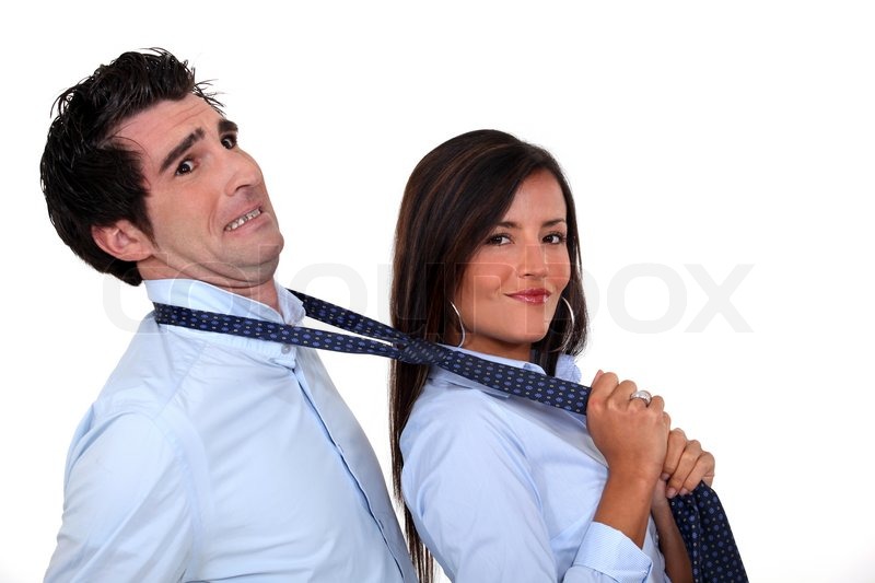 Woman Grabbing Man By Tie Stock Image Colourbox