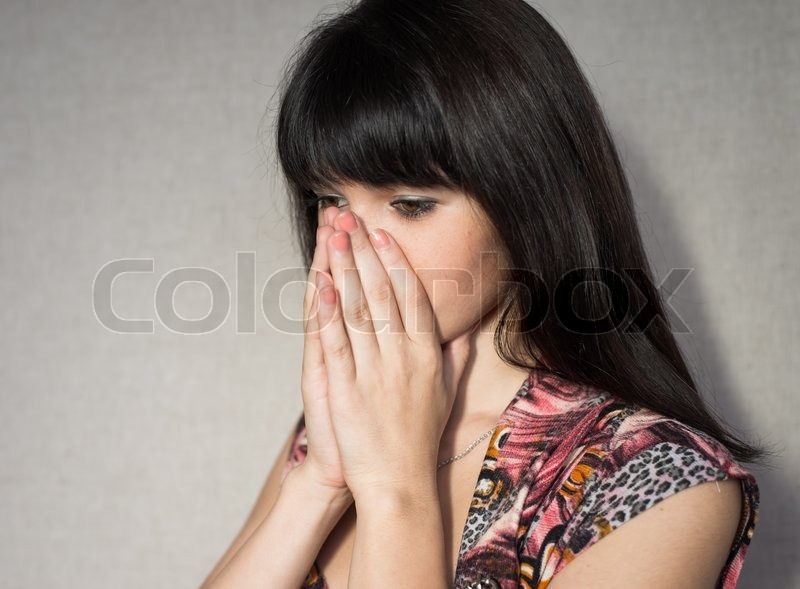 Portrait Of Young Woman Covering Her Stock Image Colourbox