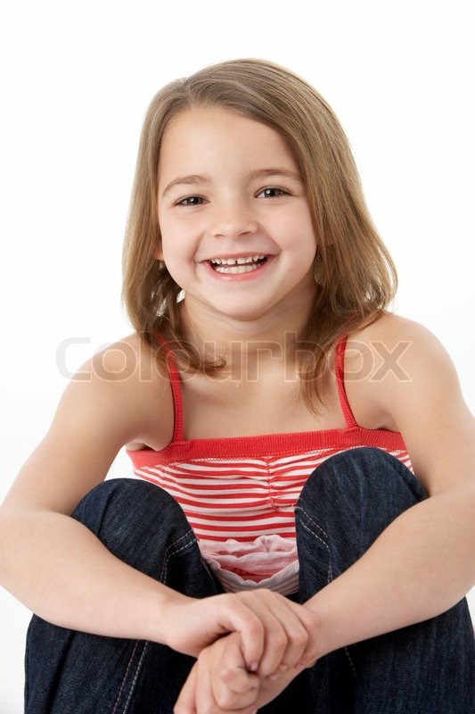 Junge Mädchen Sitzen In Studio Stock Bild Colourbox