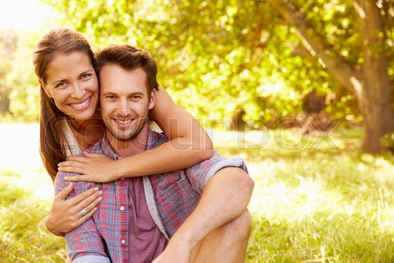 Happy Young Adult Couple Relaxing In Stock Image Colourbox