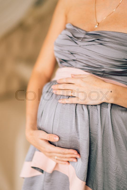 Her Hands On Pregnant Belly Studio Stock Image Colourbox