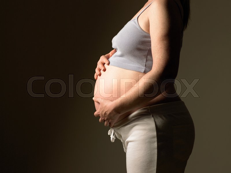 Pregnant Woman Touching Stomach Stock Image Colourbox