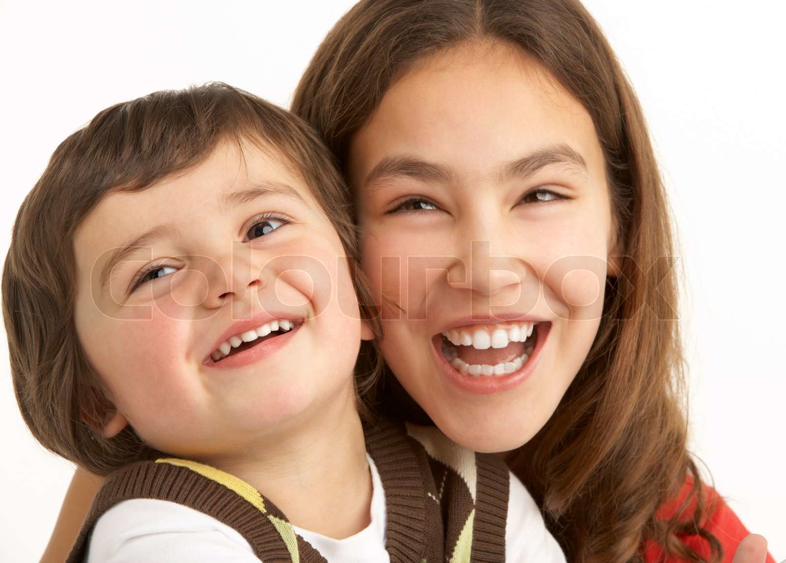 Studio Portrait Of Brother And Sister Stock Image Colourbox