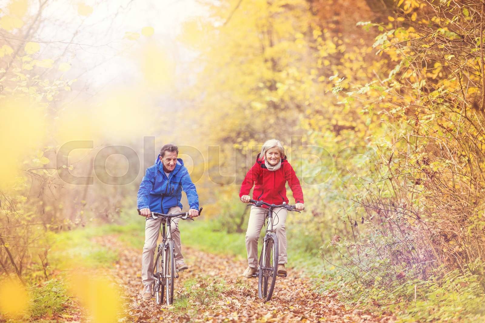 Active Seniors Riding Bike Stock Image Colourbox