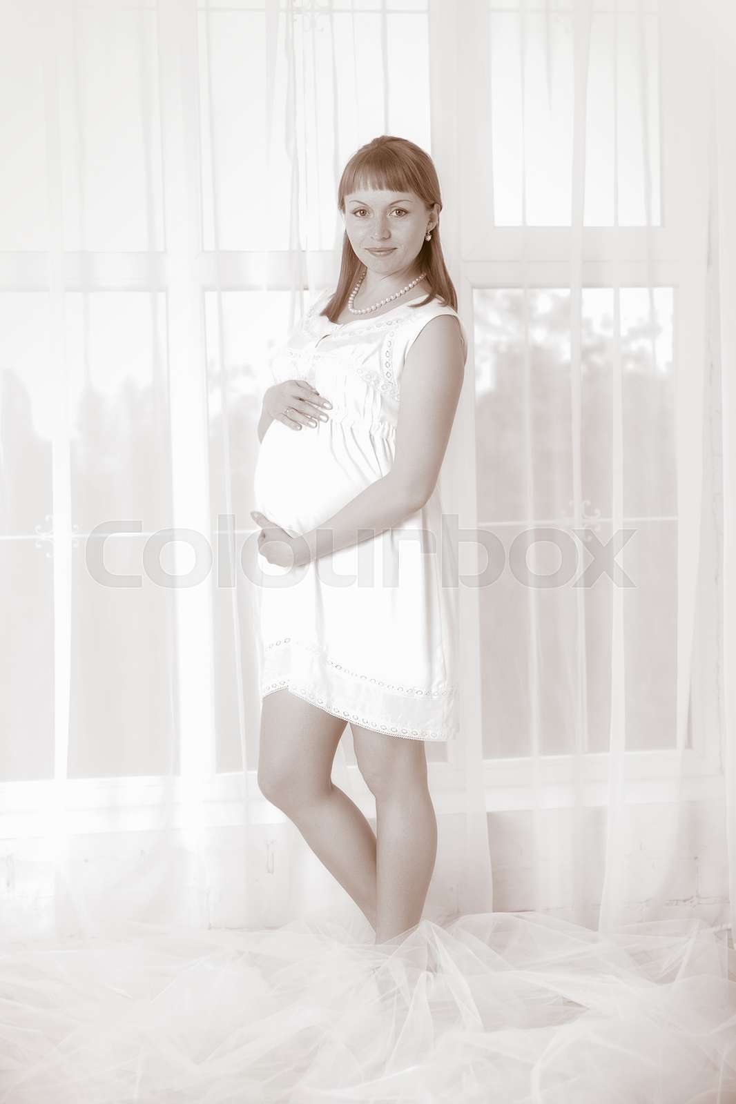 Pregnant Woman Caressing Her Belly Stock Image Colourbox