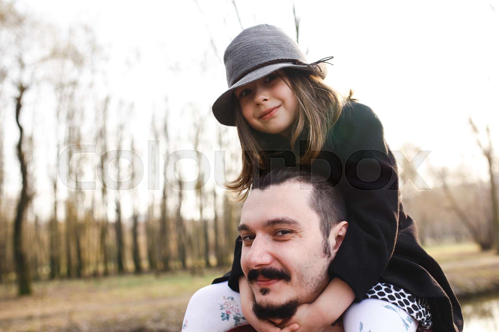 Father Carrying His Daughter Stock Image Colourbox