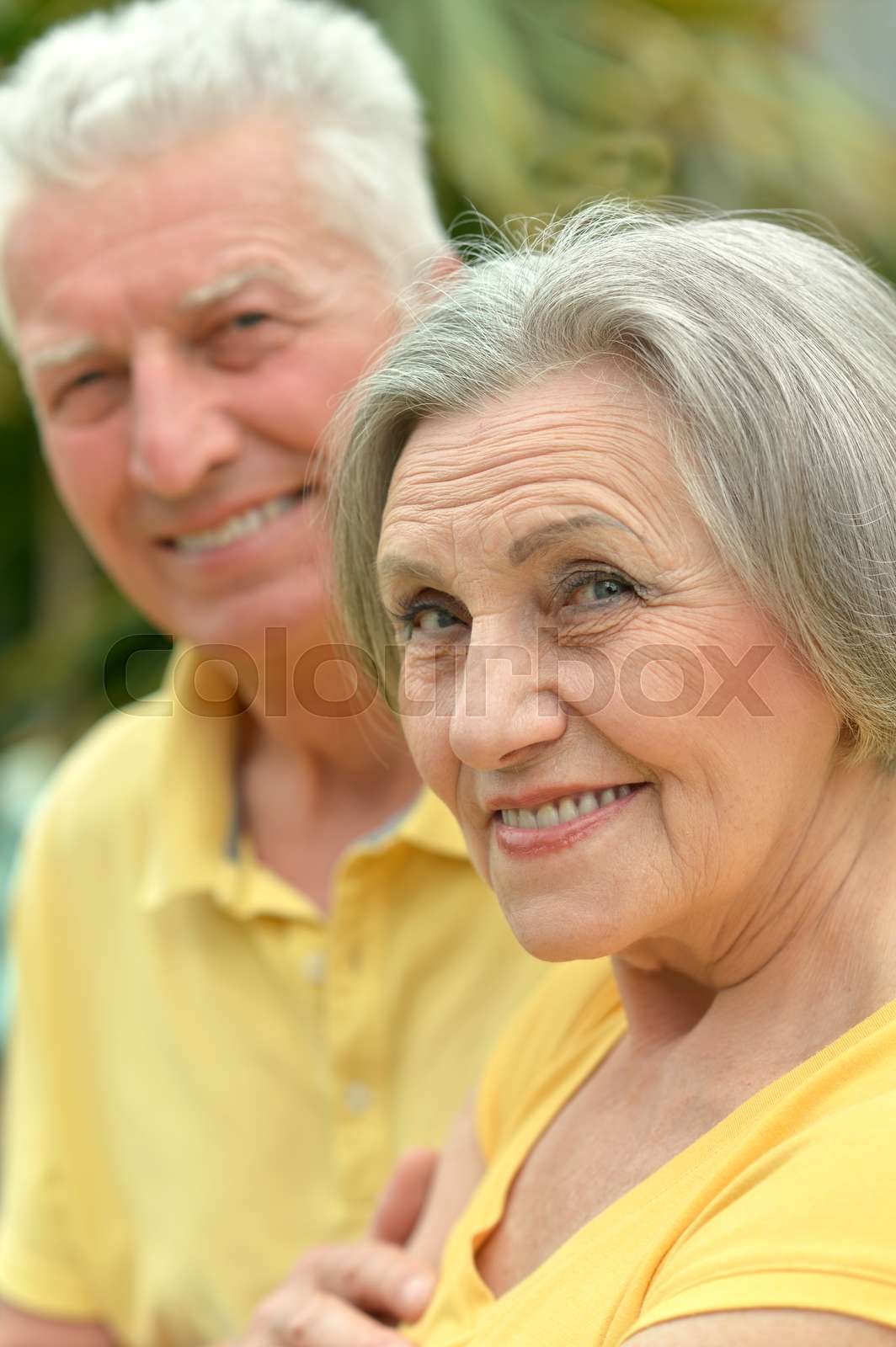 Happy Elderly Couple Embracing Stock Image Colourbox