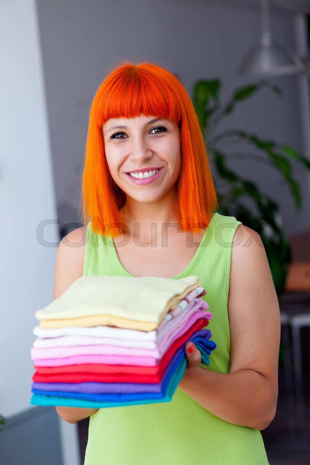 Redhead Woman Doing Laundry Stock Image Colourbox