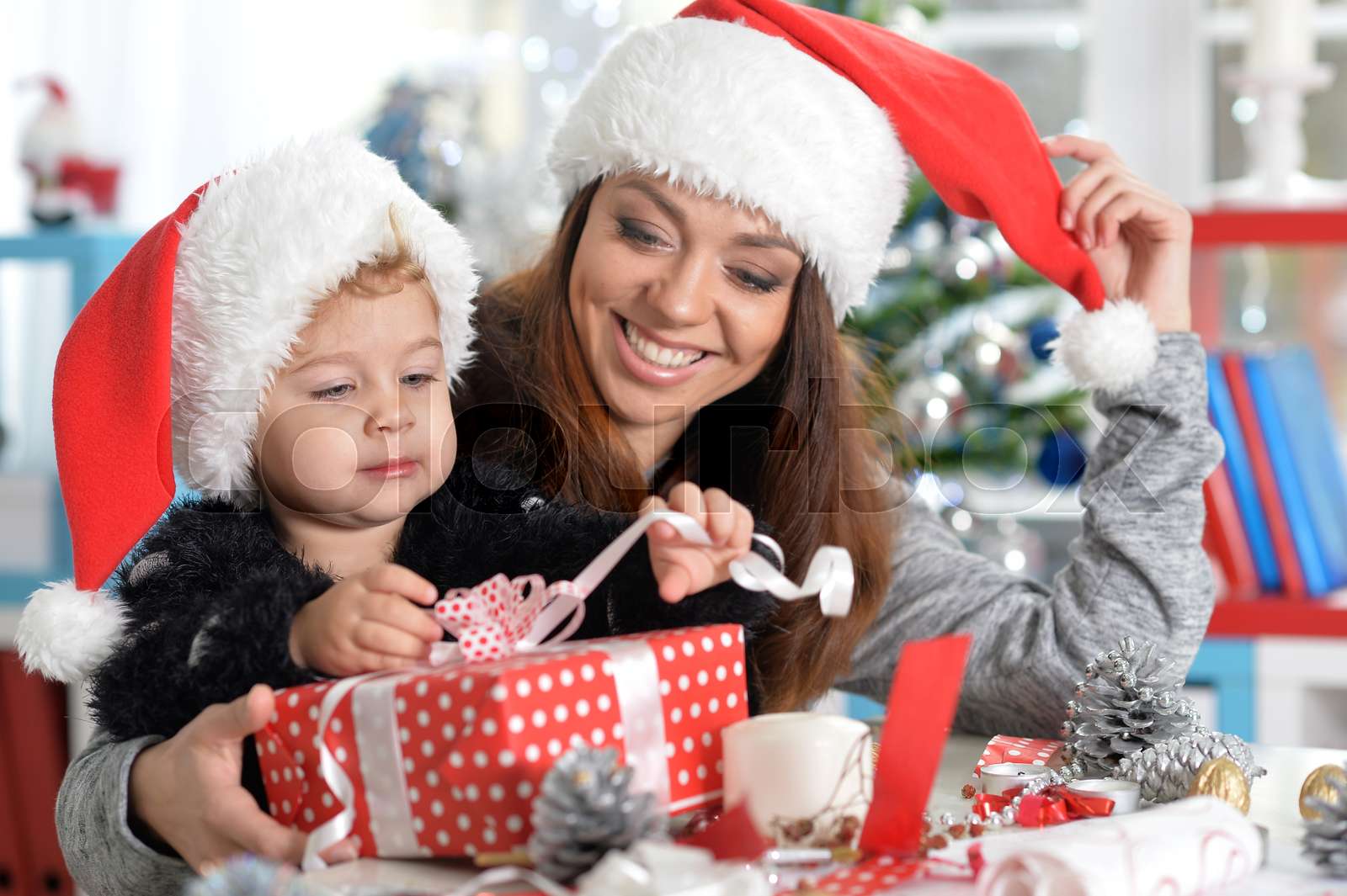 Mother And Daughter Preparing For Christmas Stock Image Colourbox