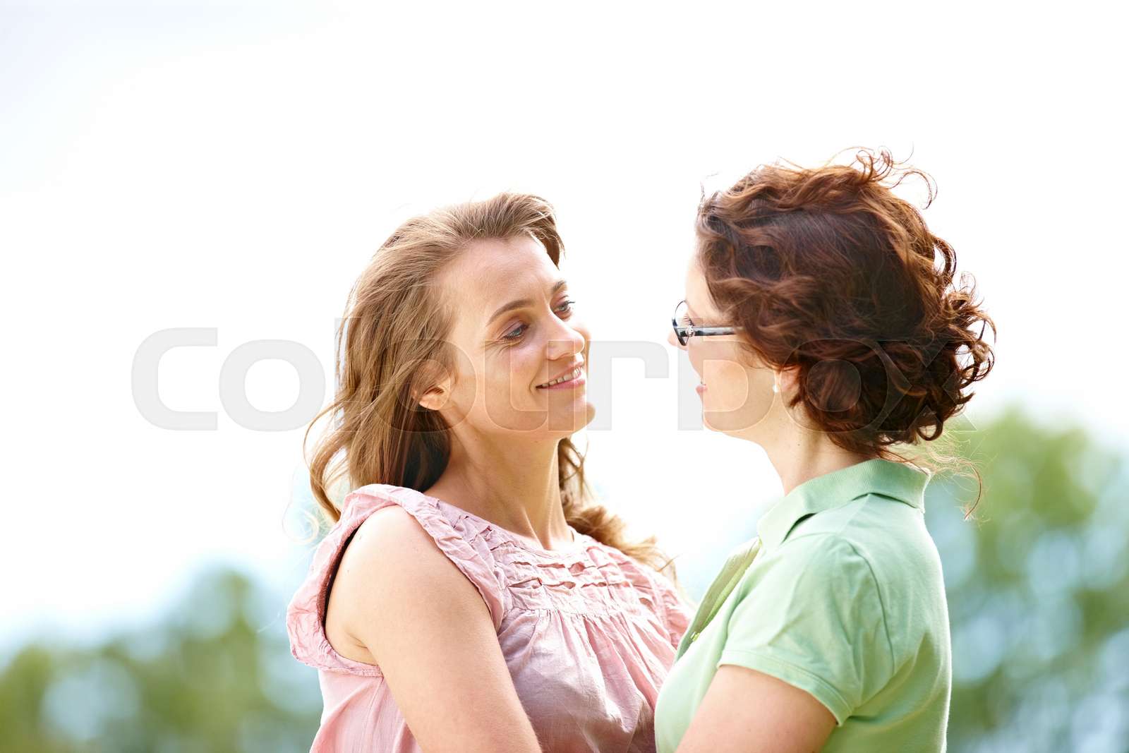 Two Women In Loving Embrace Stock Image Colourbox