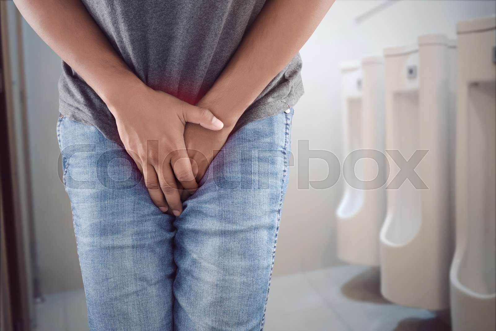 Asian Man Wants To Pee And Is Holding His Bladder Stock Image