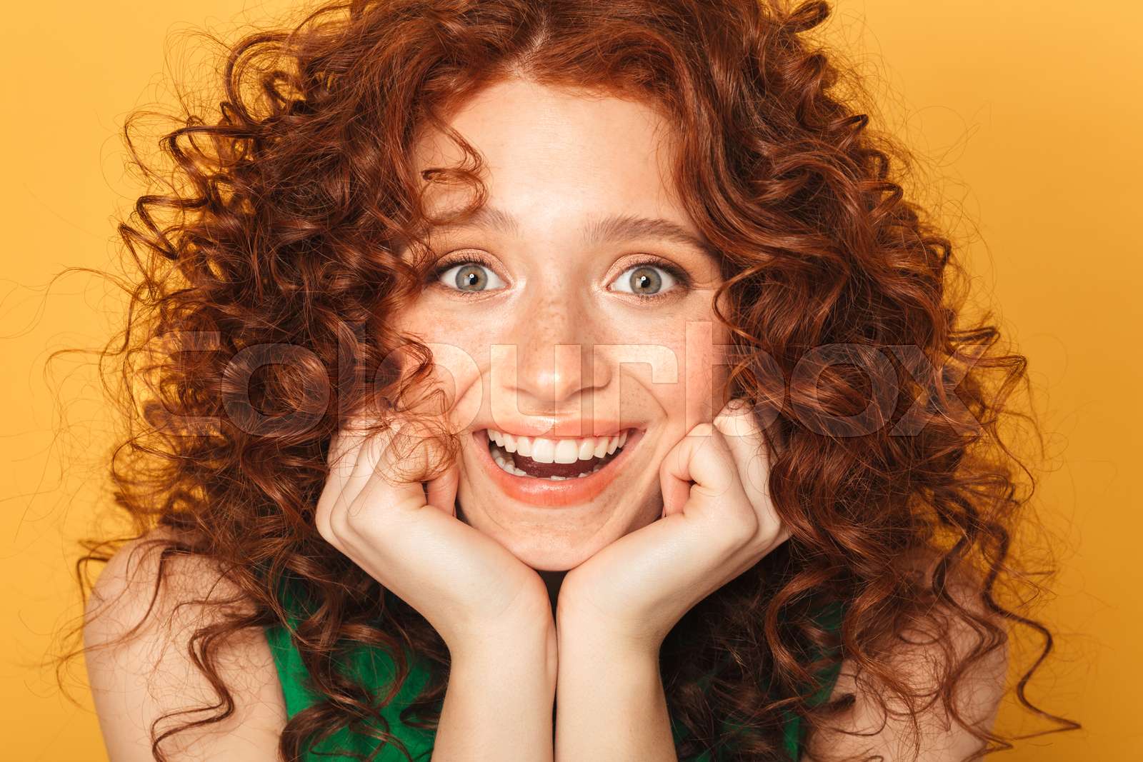 Close Up Portrait Of A Laughing Curly Redhead Woman Stock Image