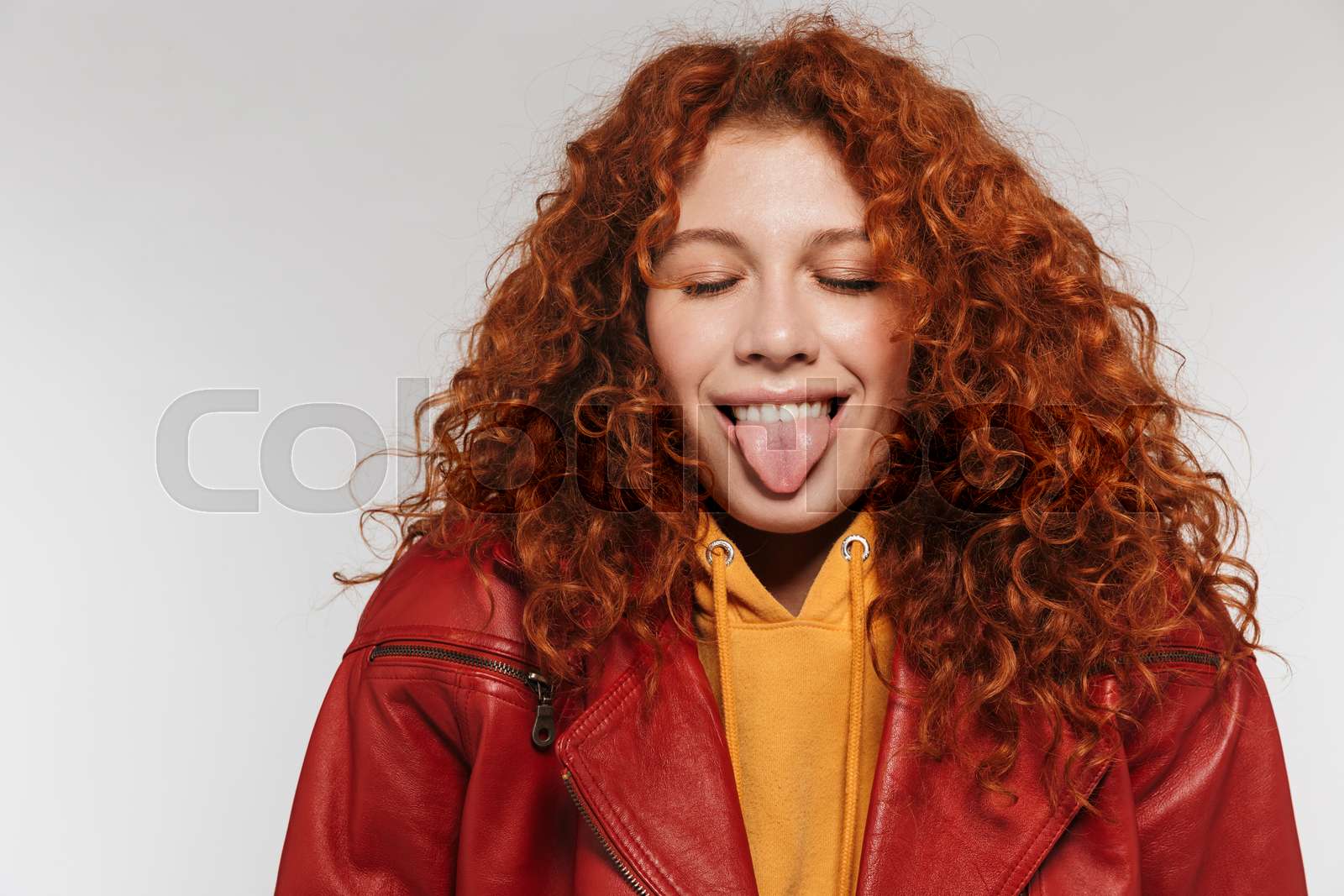 Portrait Of Funny Redhead Woman 20s Wearing Leather Jacket Smiling And