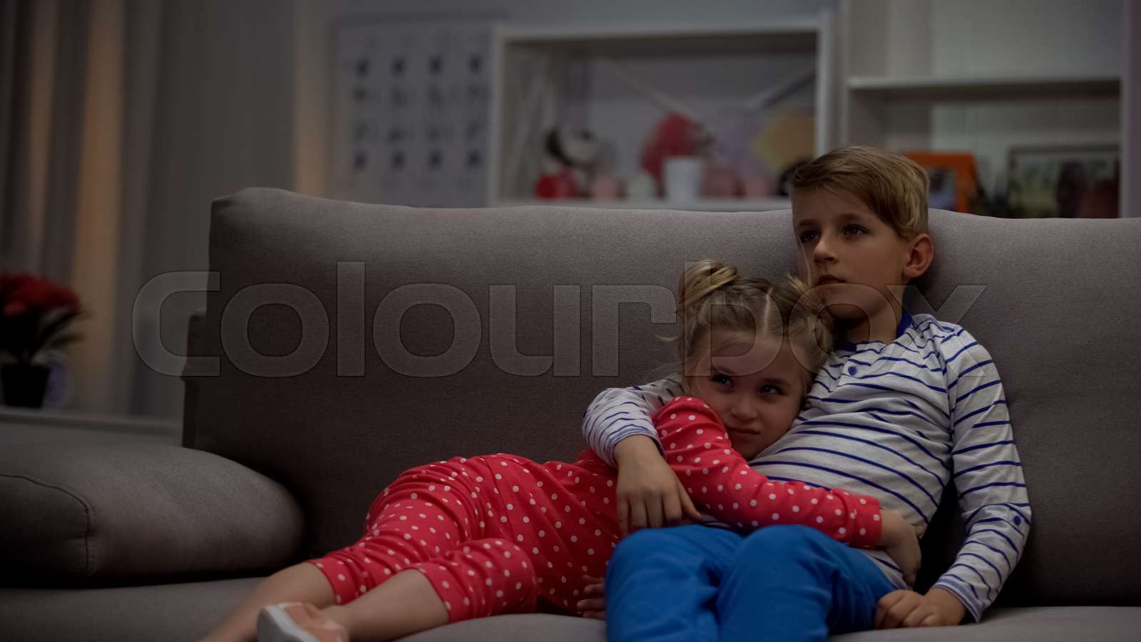 Brother Embracing Girl Watching Horror Movie Protecting Sister From