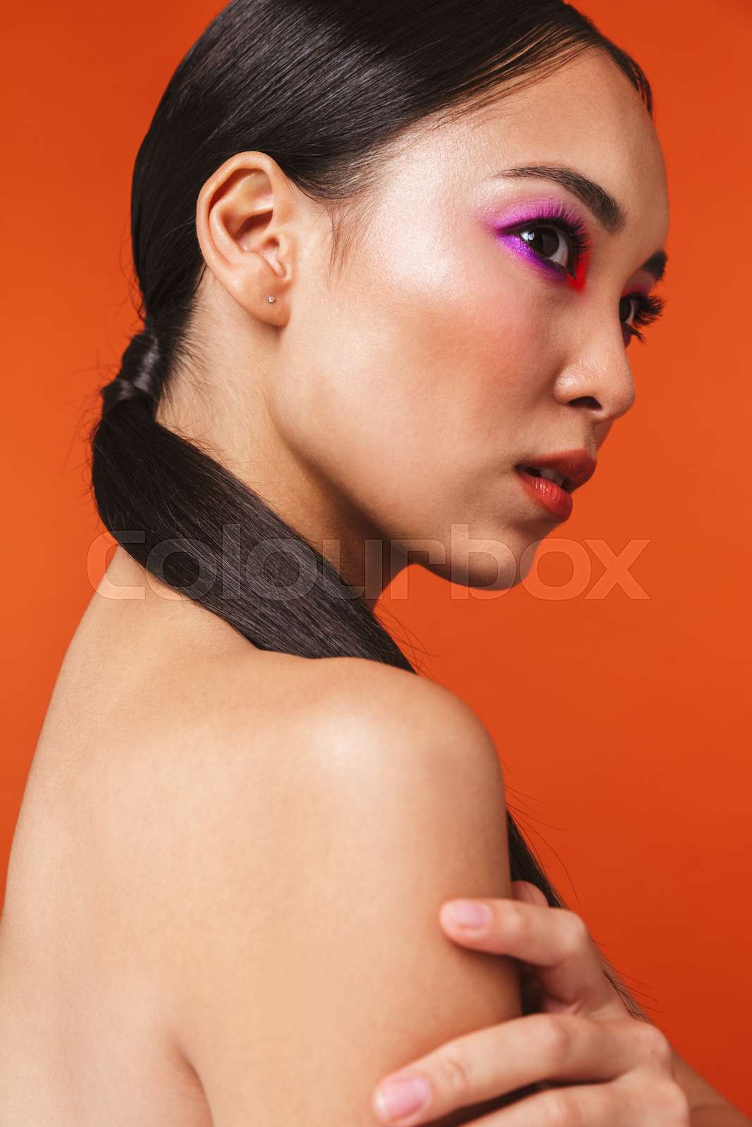 Beauty Portrait Of An Attractive Young Topless Asian Woman Stock