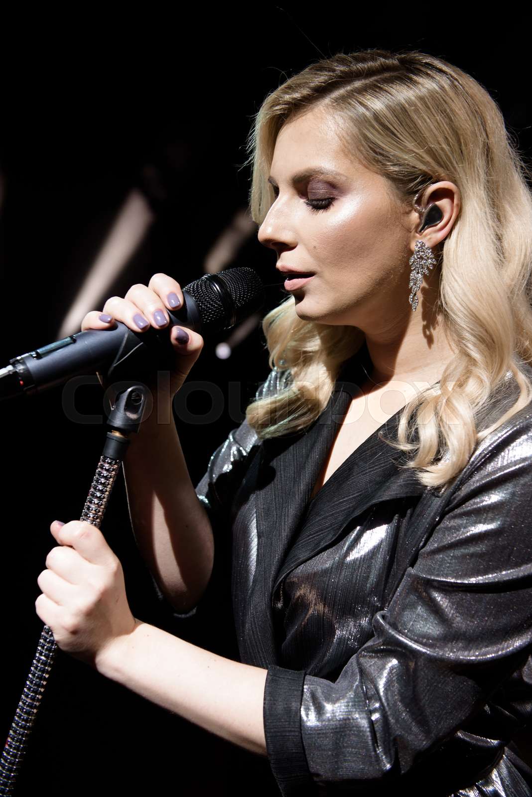 Microphone And Female Singer Close Up Woman Singing Into A Microphone