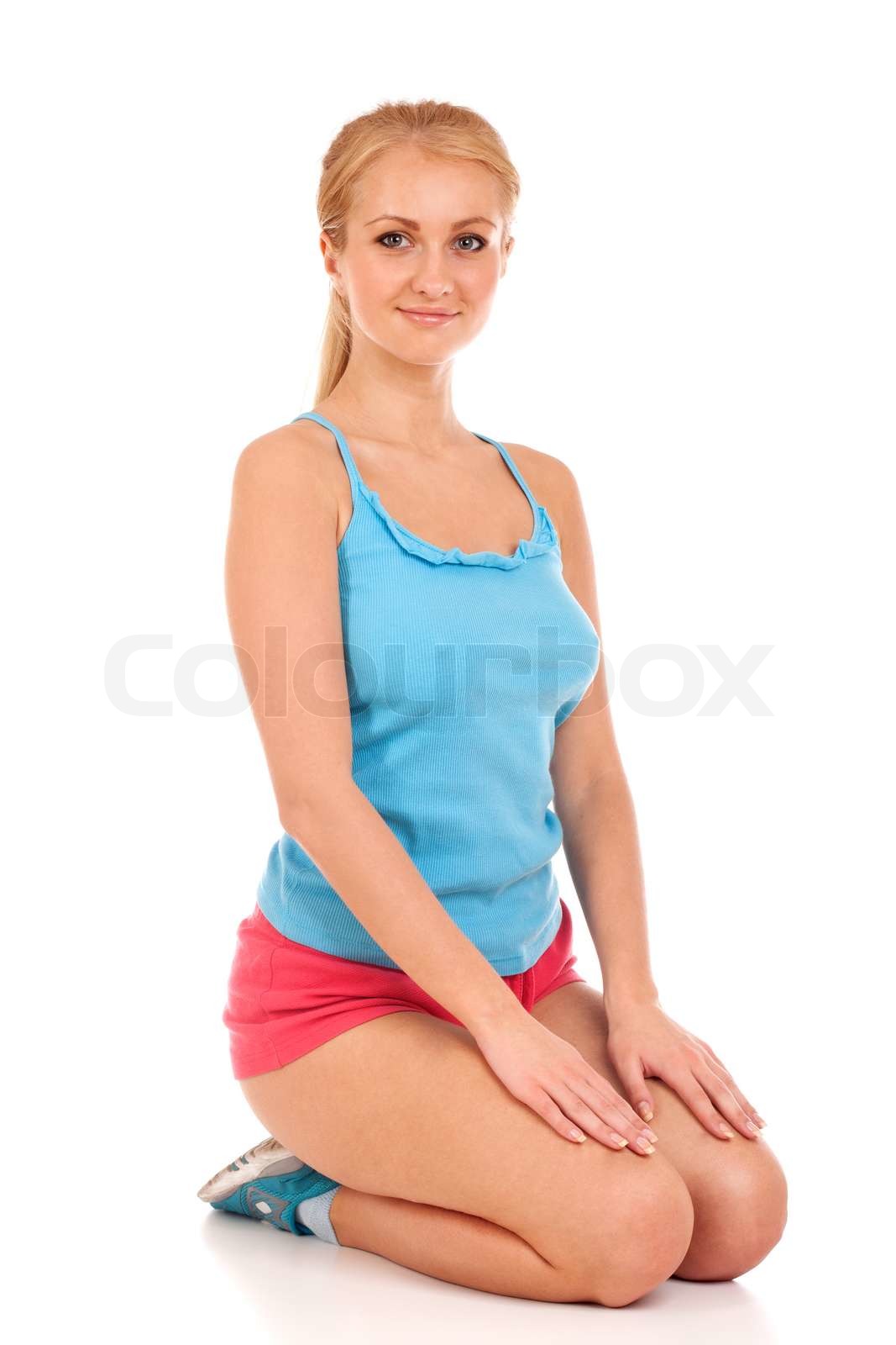 Beautiful Woman Sitting On Her Knees Stock Image Colourbox