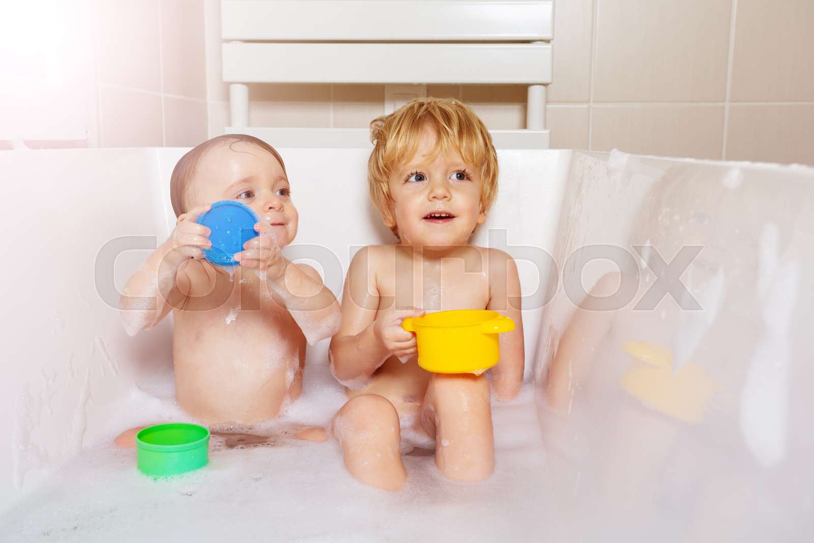 Brother And Sister Babies Play In The Bathroom Stock Image Colourbox