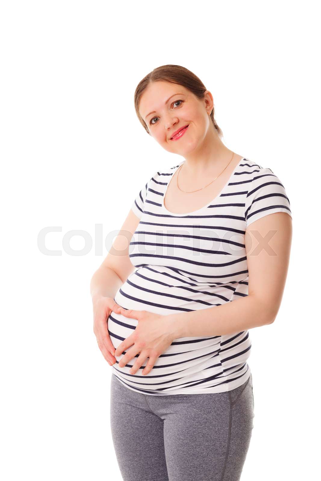 Pregnant Woman Standing Embracing Her Belly Stock Image Colourbox