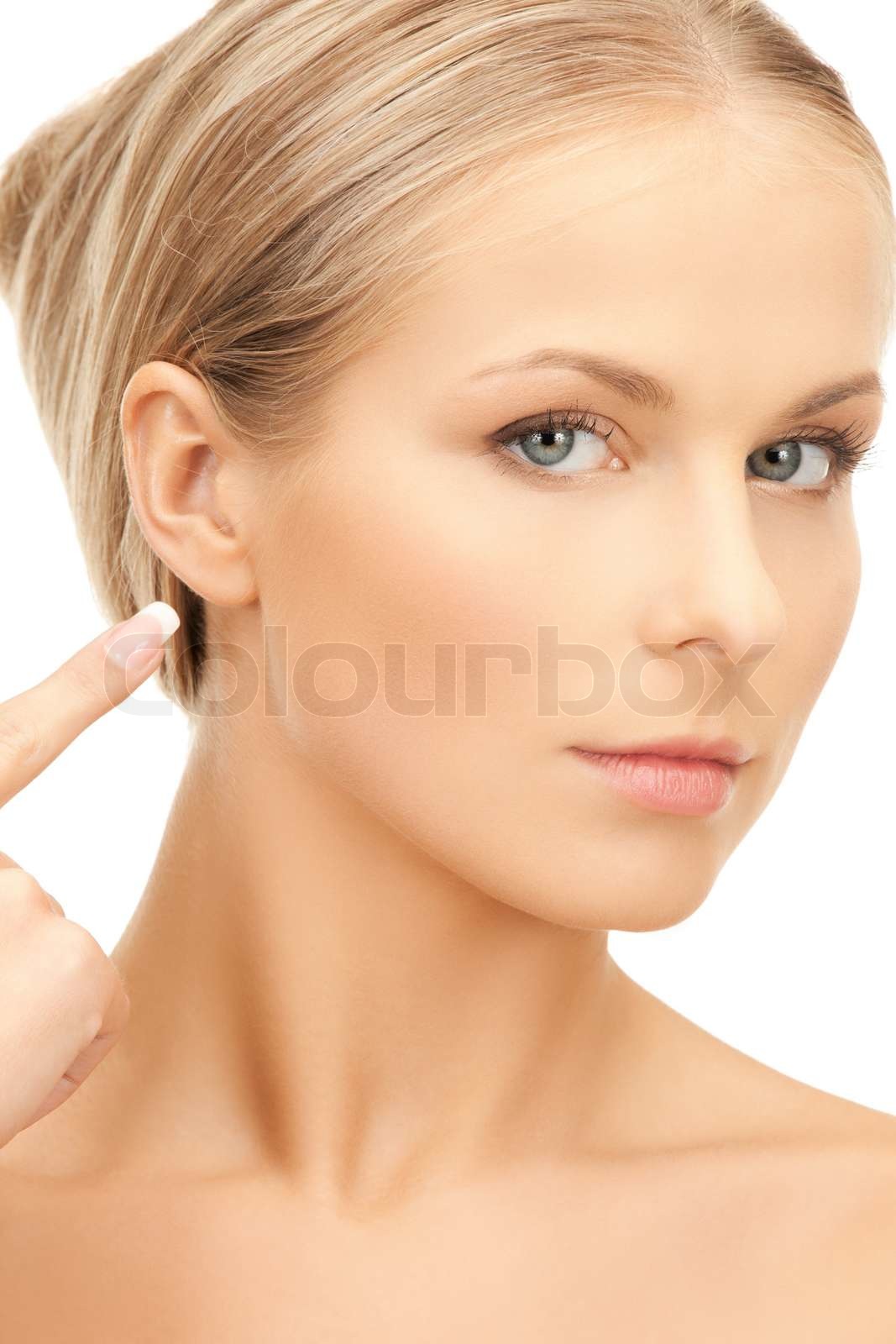 Woman Pointing To Ear Stock Image Colourbox