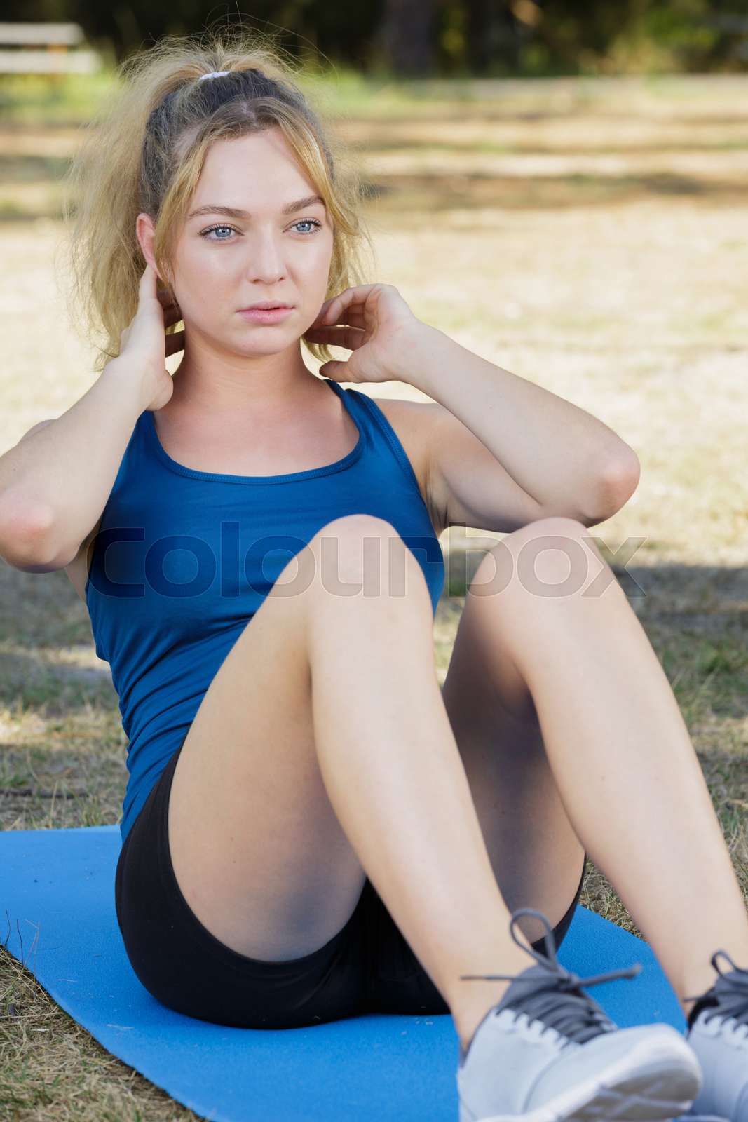 Beautiful Female Doing Abdominal Crunches Stock Image Colourbox