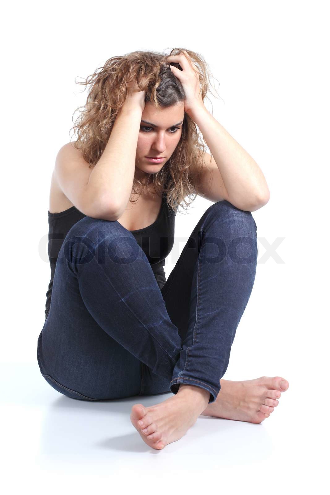 Portrait Of A Full Body Of A Girl Worried With Both Hands On The Head