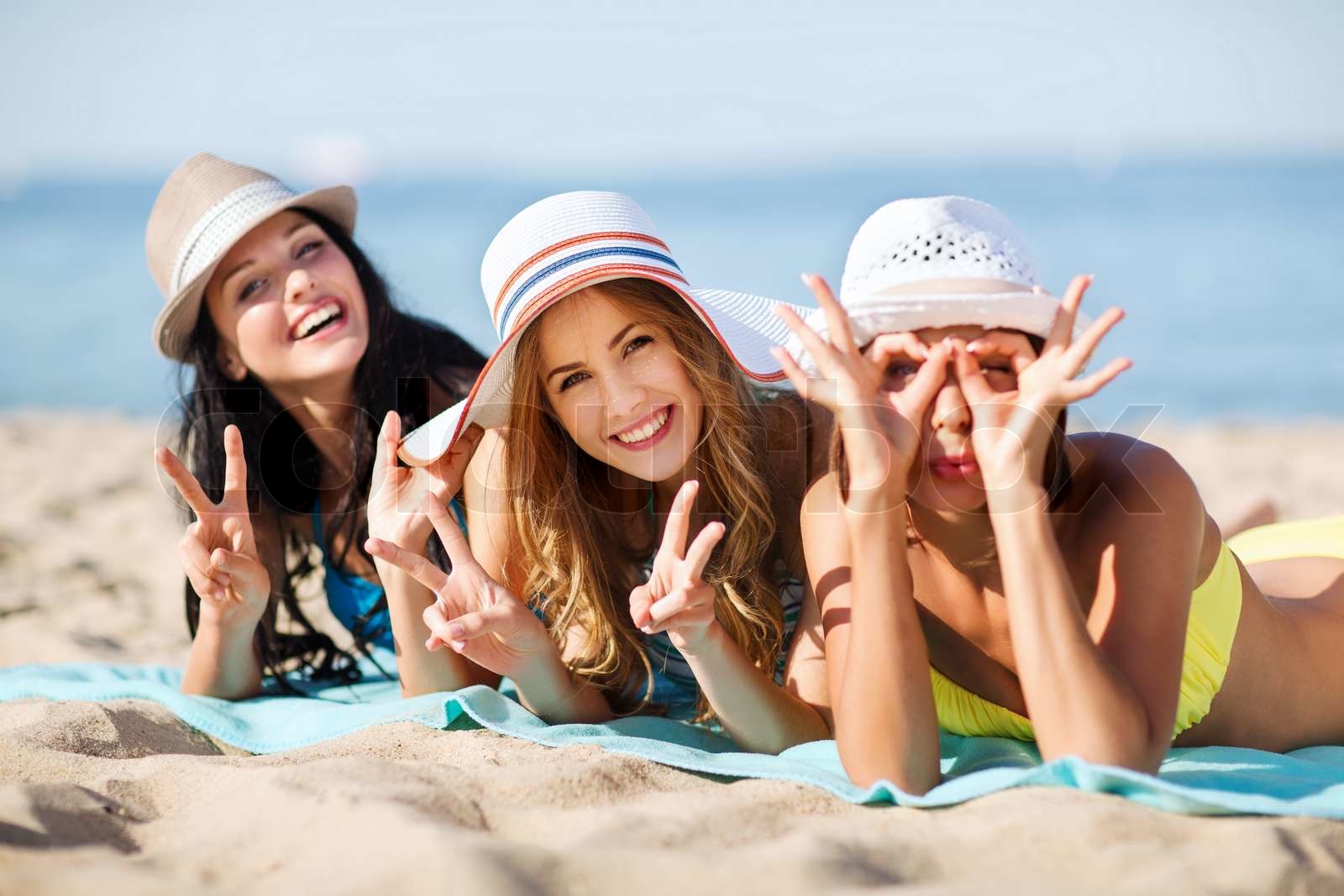 Girls Sunbathing On The Beach Stock Image Colourbox