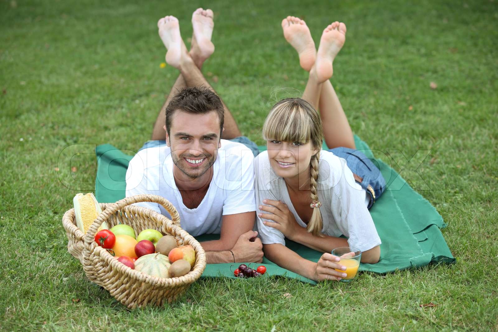 Couple Enjoying Picnic In Park Stock Image Colourbox