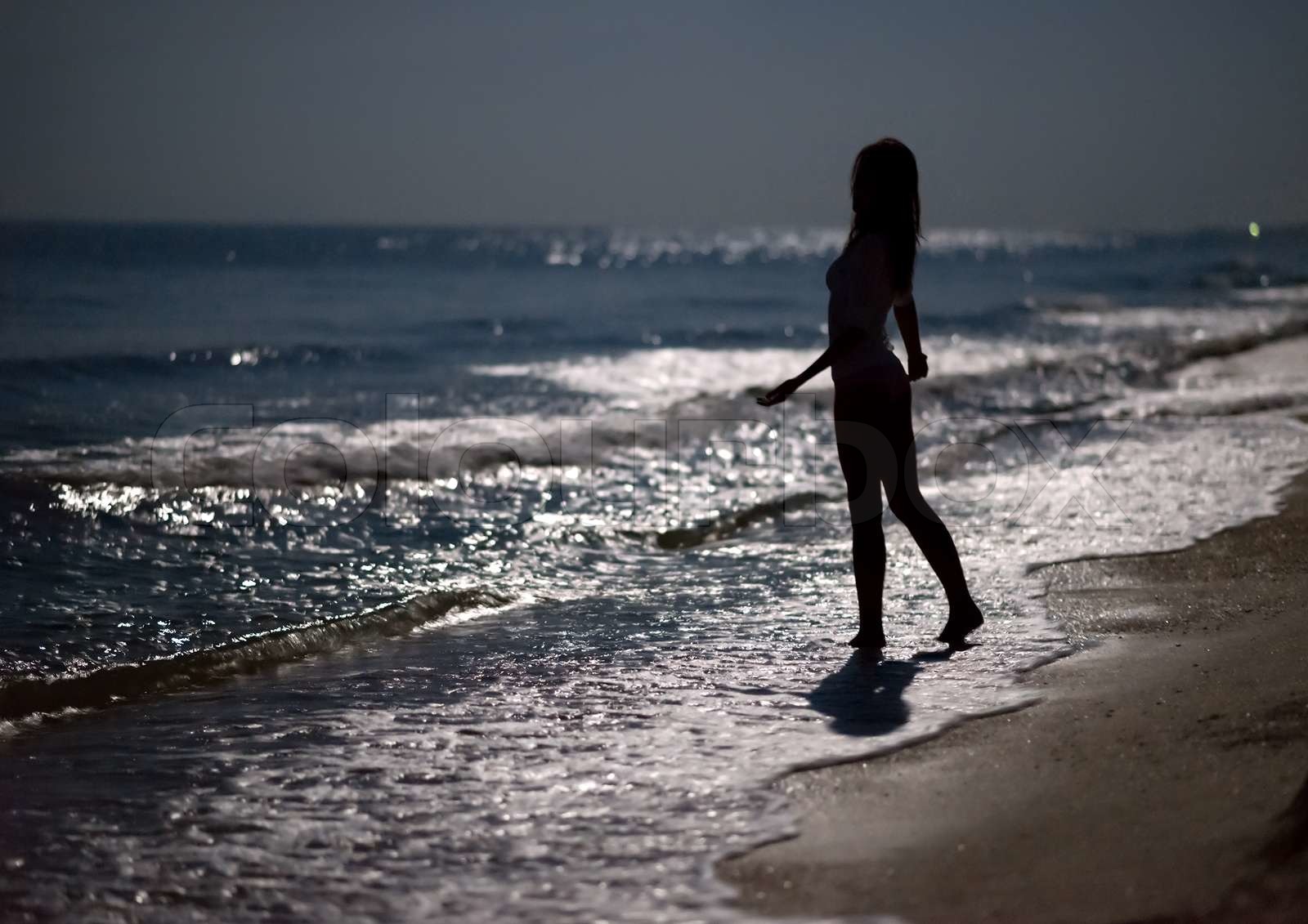 Girl On The Beach At Night Stock Image Colourbox