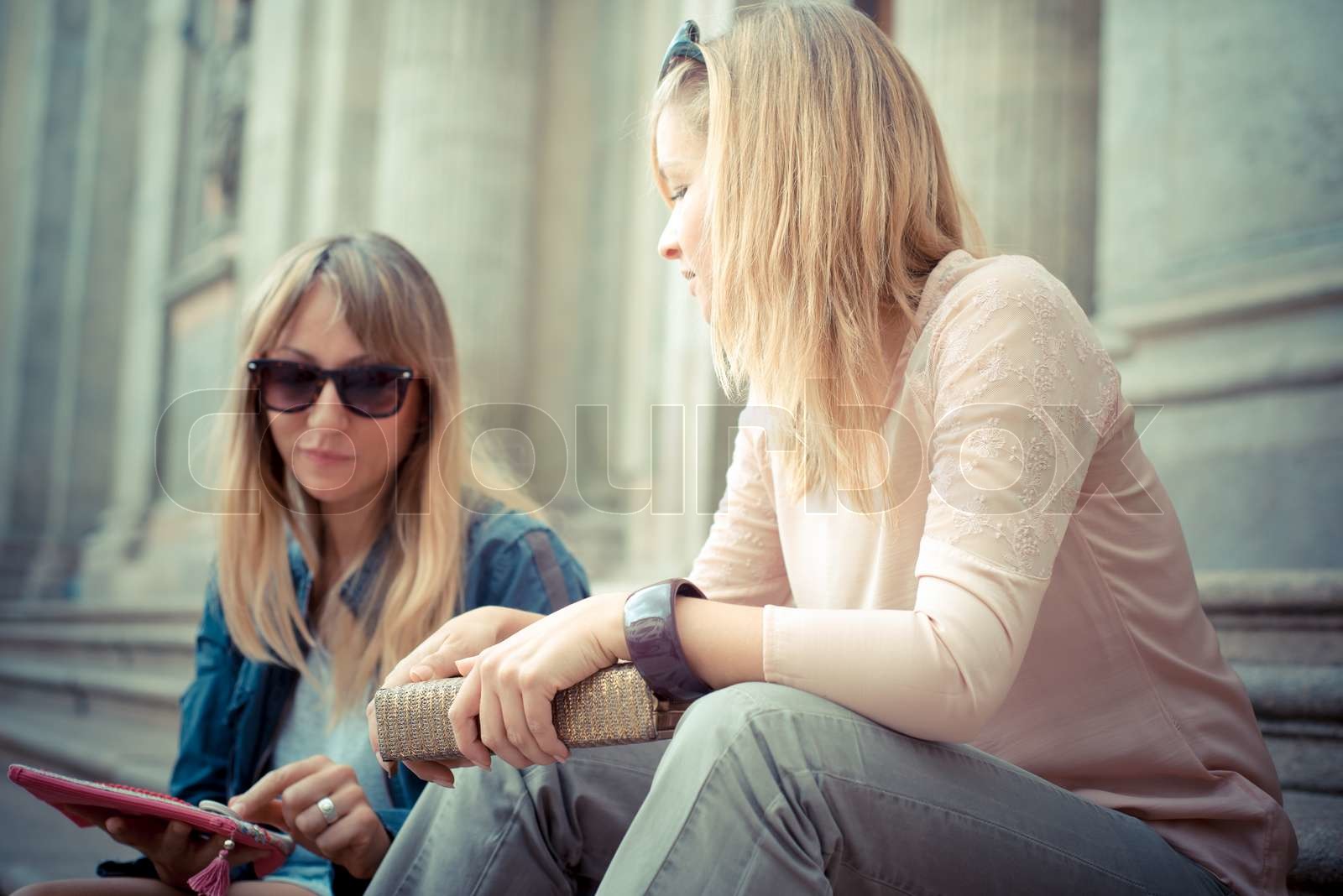 Two Beautiful Blonde Women Talking Stock Image Colourbox