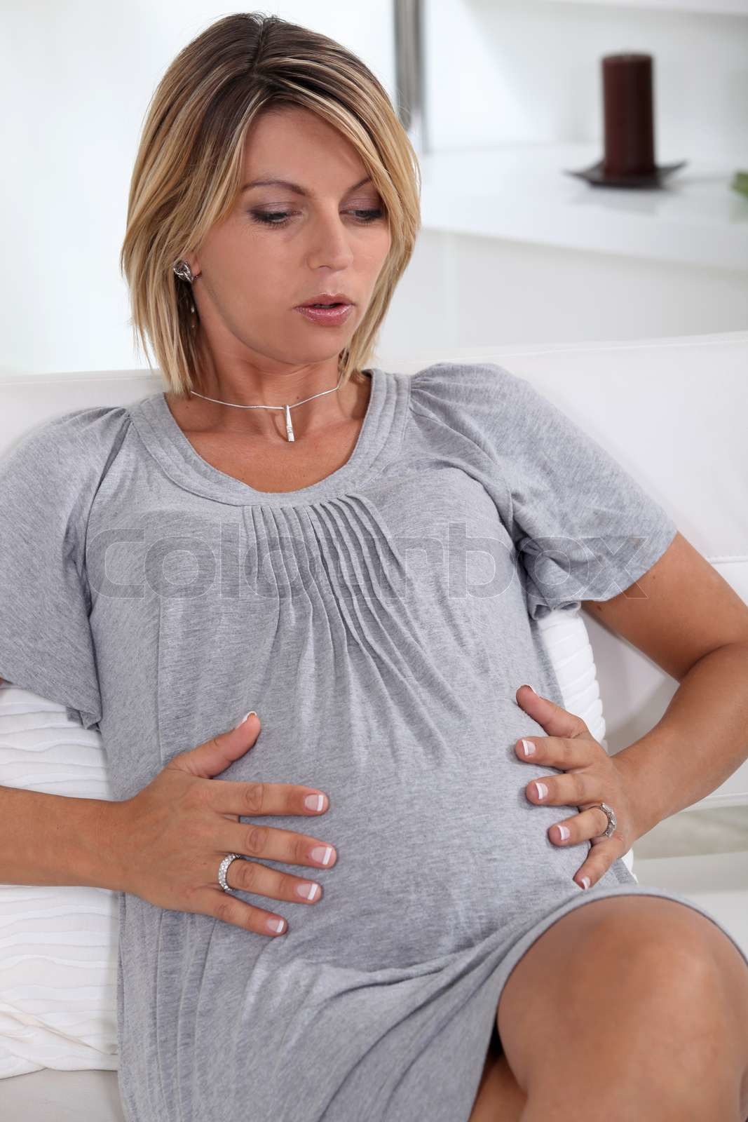 Woman Holding Her Very Pregnant Stomach Stock Image Colourbox
