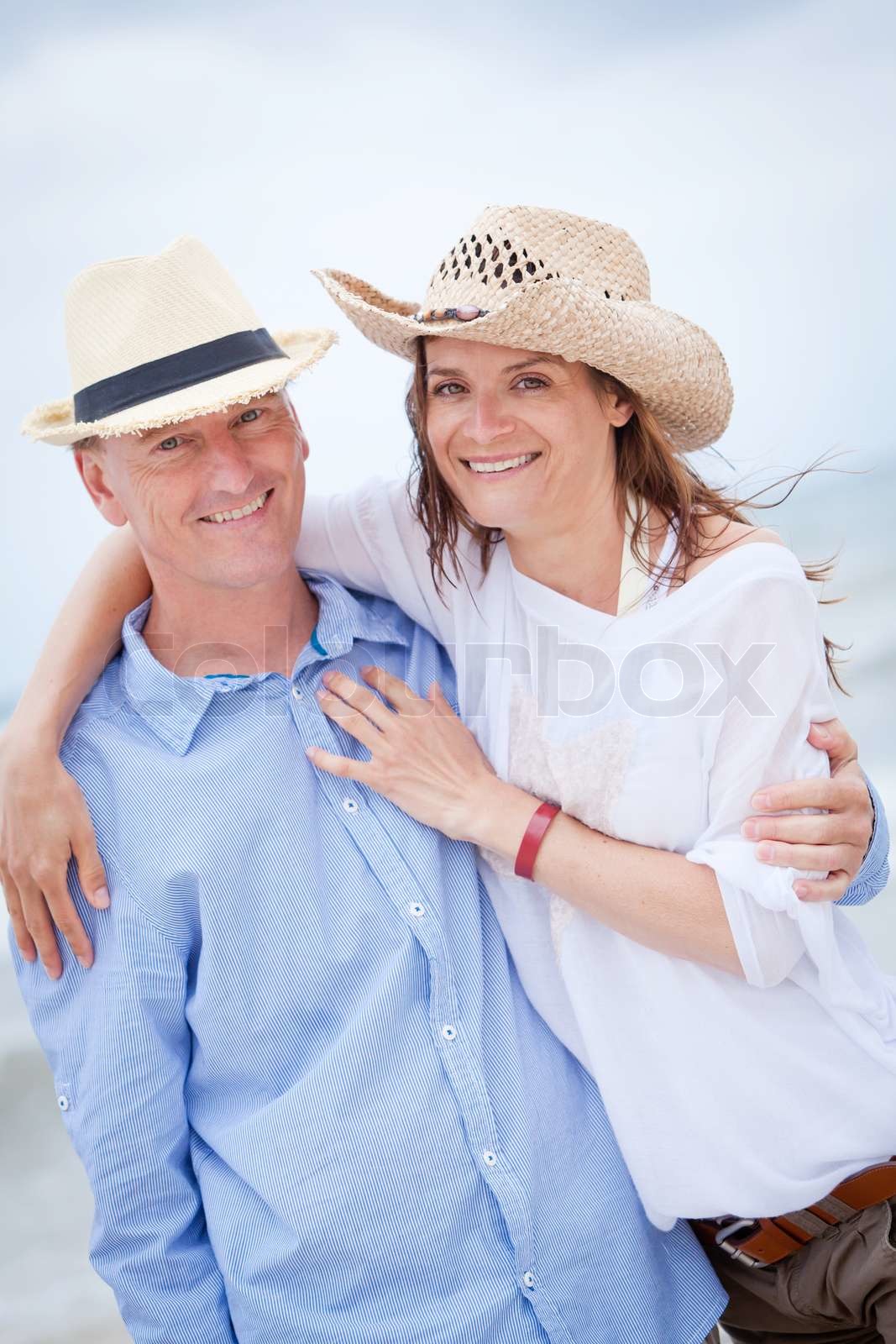 Happy Adult Couple In Summertime On Beach Stock Image Colourbox