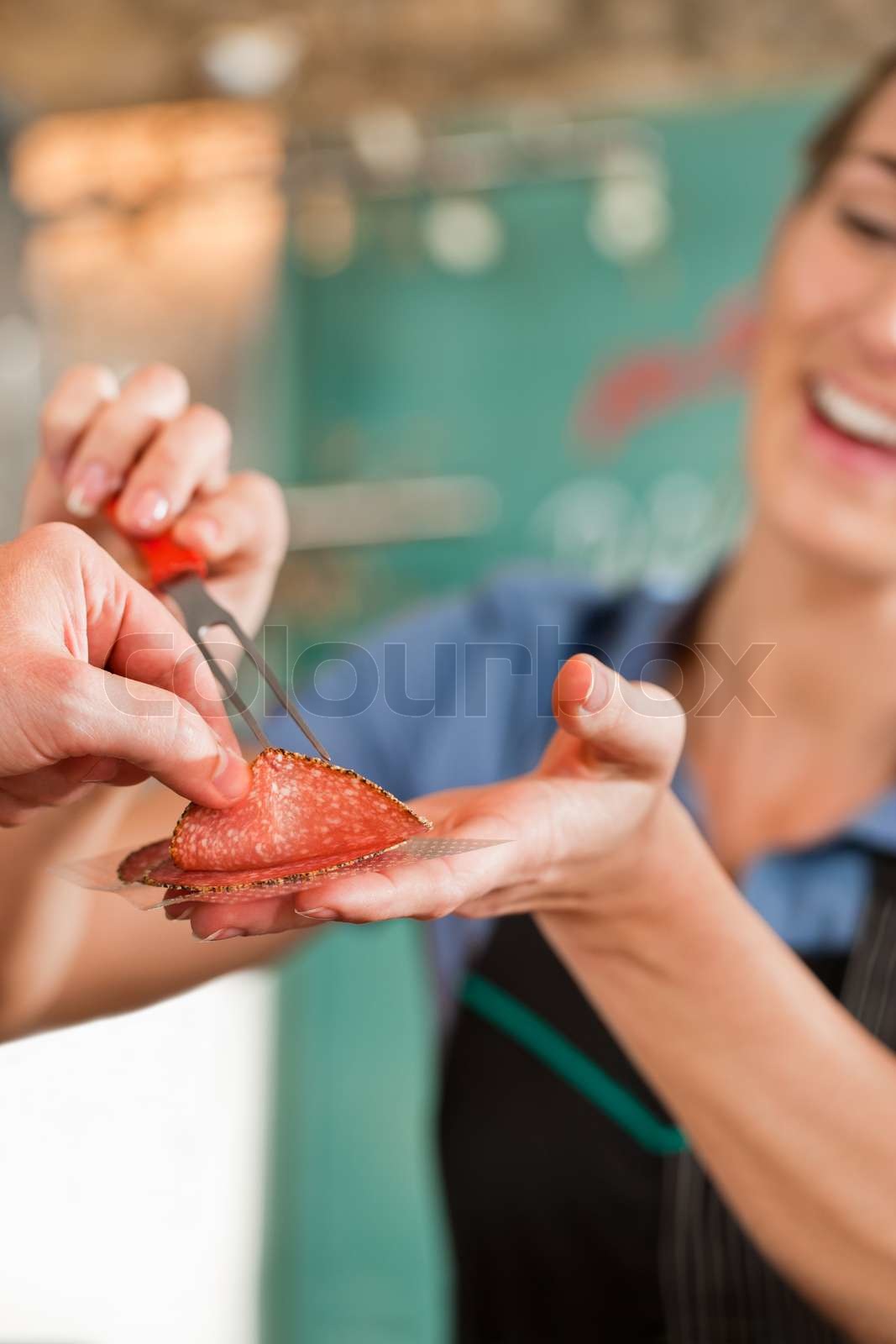 Female Butcher Selling Fresh Meat To Customer Stock Image Colourbox