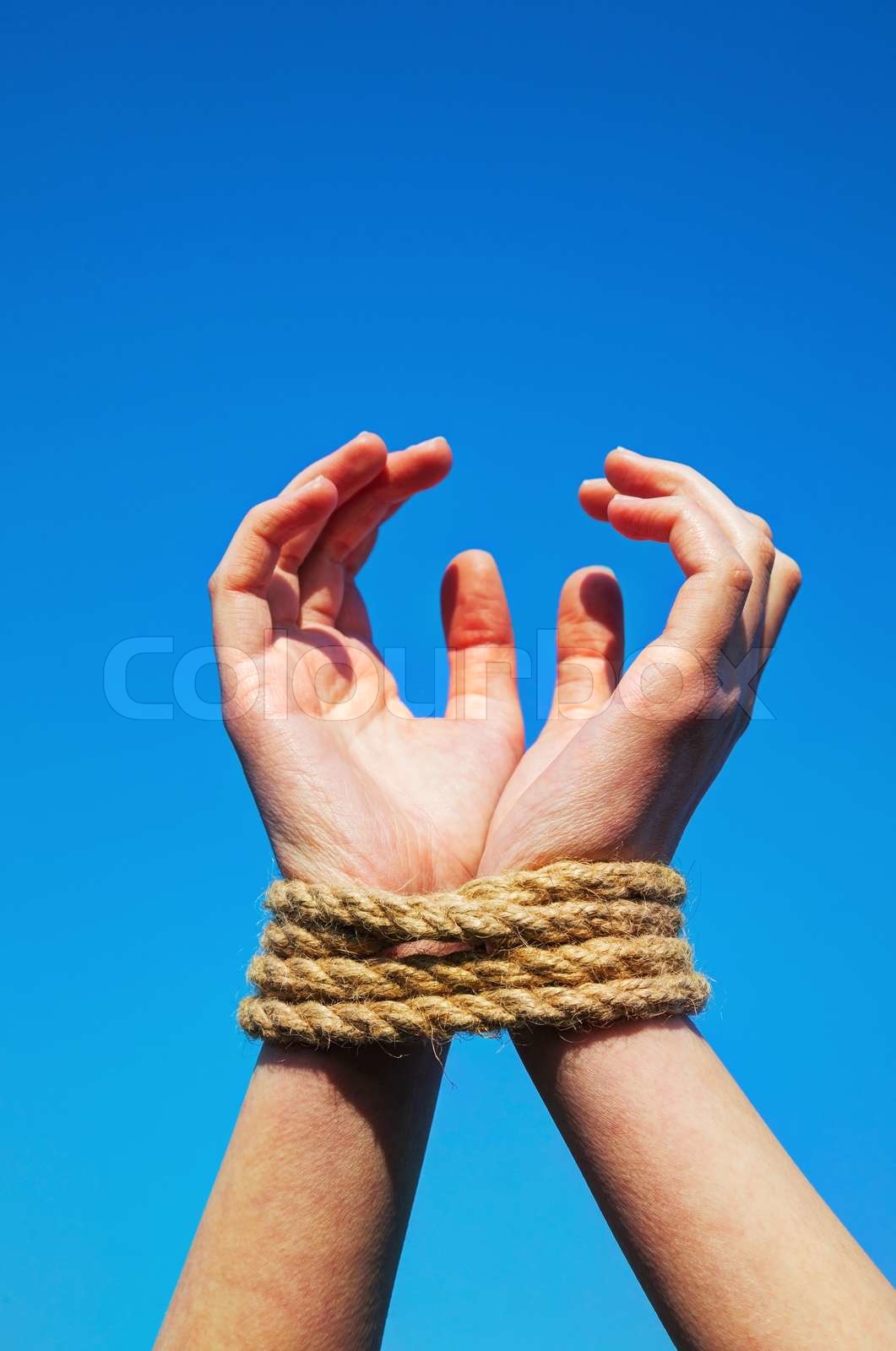 Hands Tied Up With Rope Stock Image Colourbox