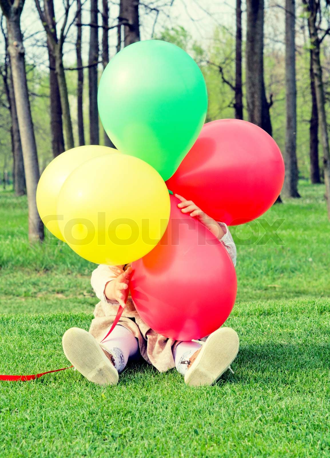 Hiding Behind Balloons Stock Image Colourbox