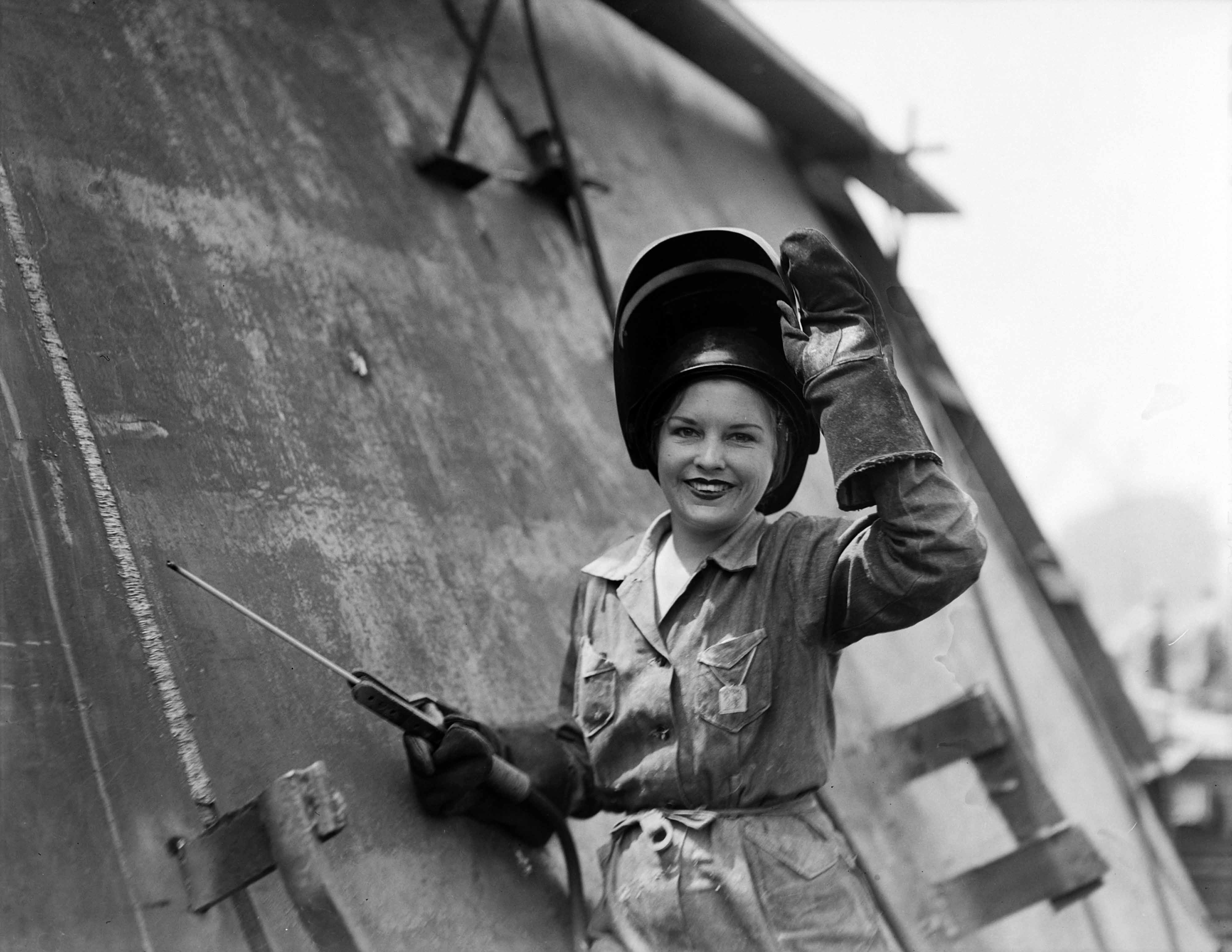 A Photograph Of A Woman Working In The Naval Shipyard In Brunswick