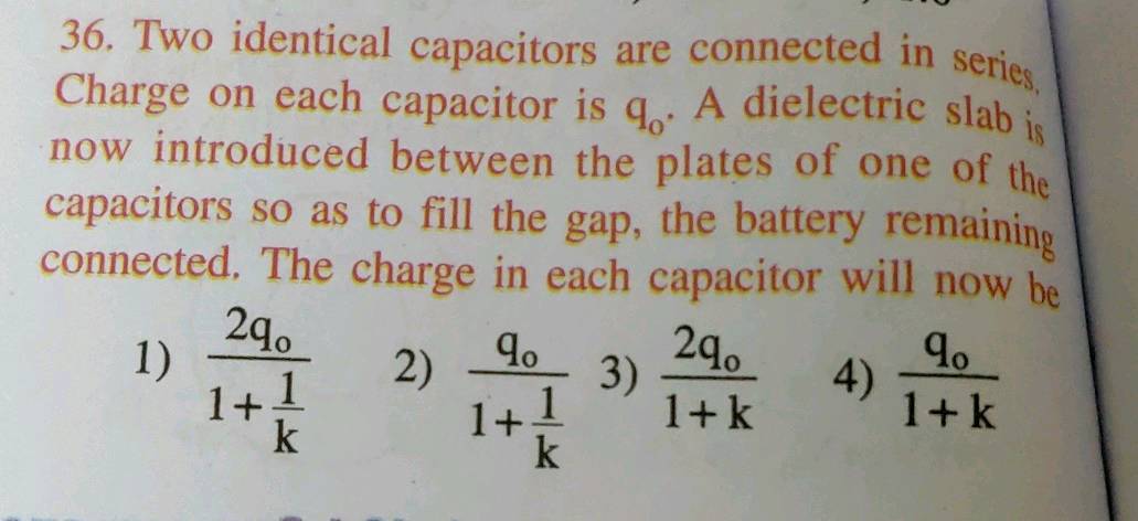 Two Identical Capacitors Are Connected As Shown In The Figure A