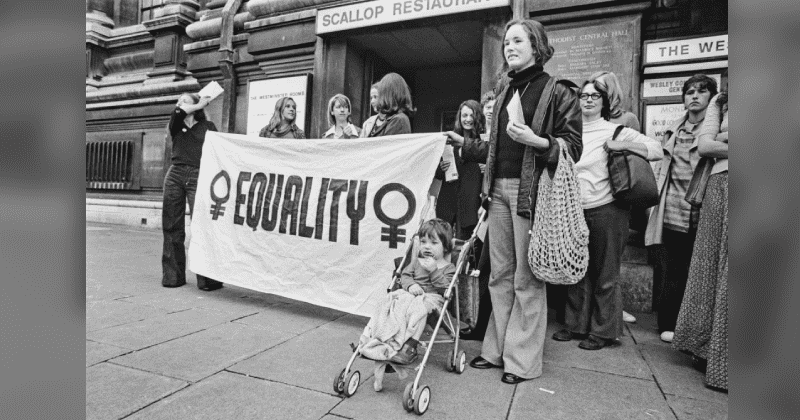 Activists Stand With A Banner Reading Equality At A Demonstration