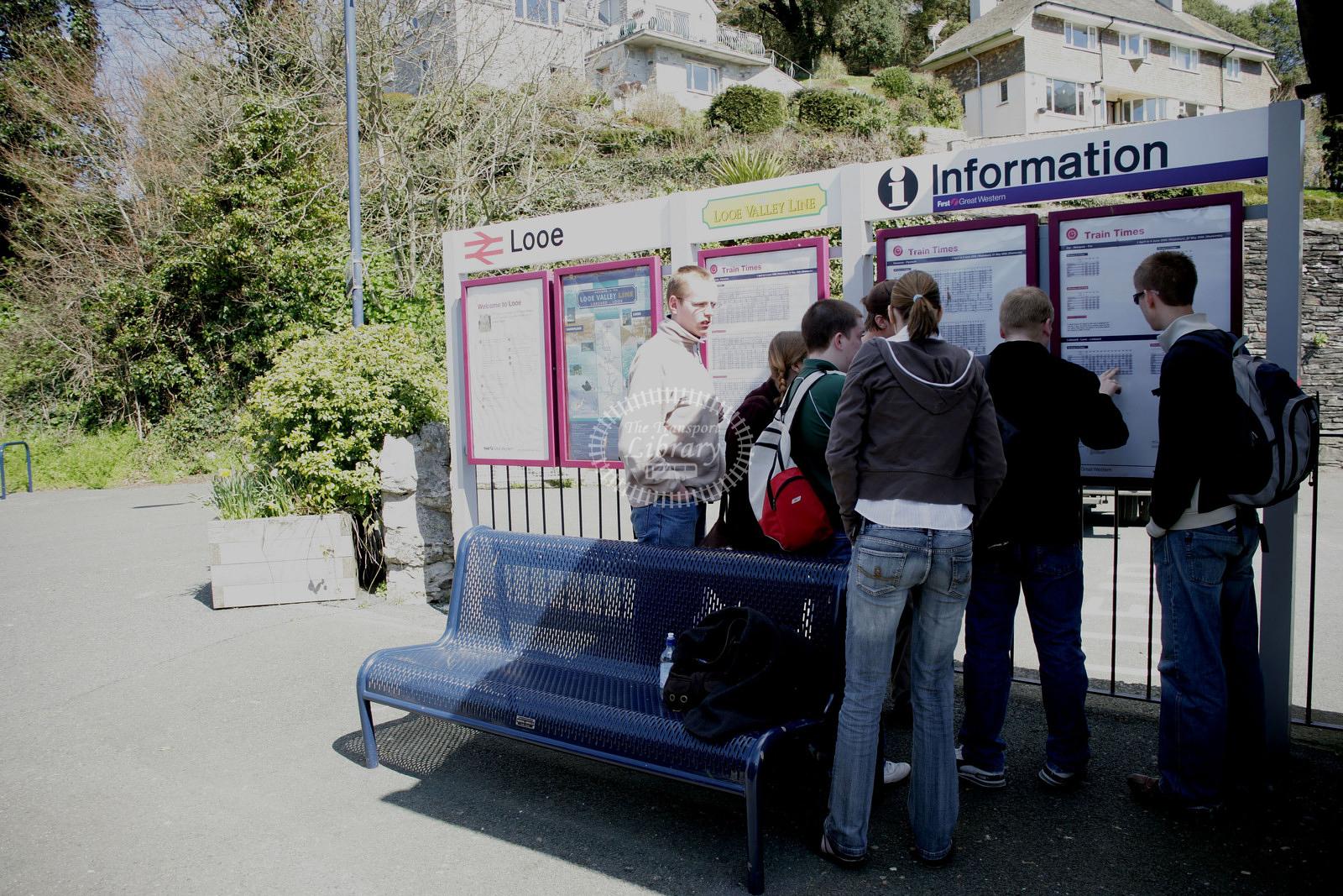 The Transport Library Young Travellers Check The Train Times At Looe